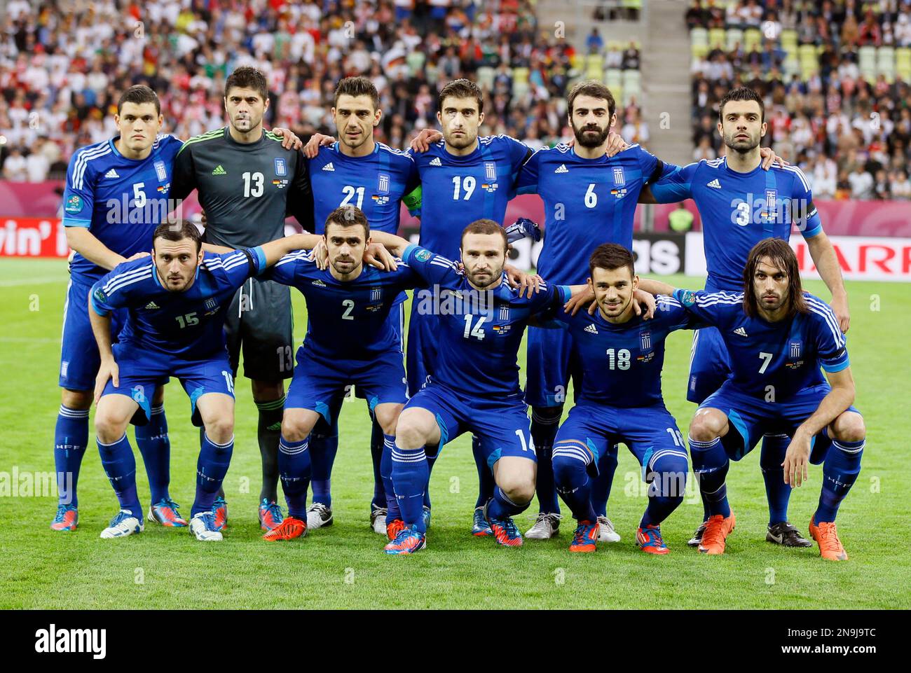 Greece's Kyriakos Papadopoulos, goalkeeper Michalis Sifakis, Costas ...