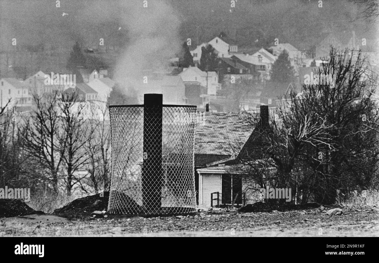 FILE - In this Jan. 26, 1983 file photo, smoke rises from the ground in ...