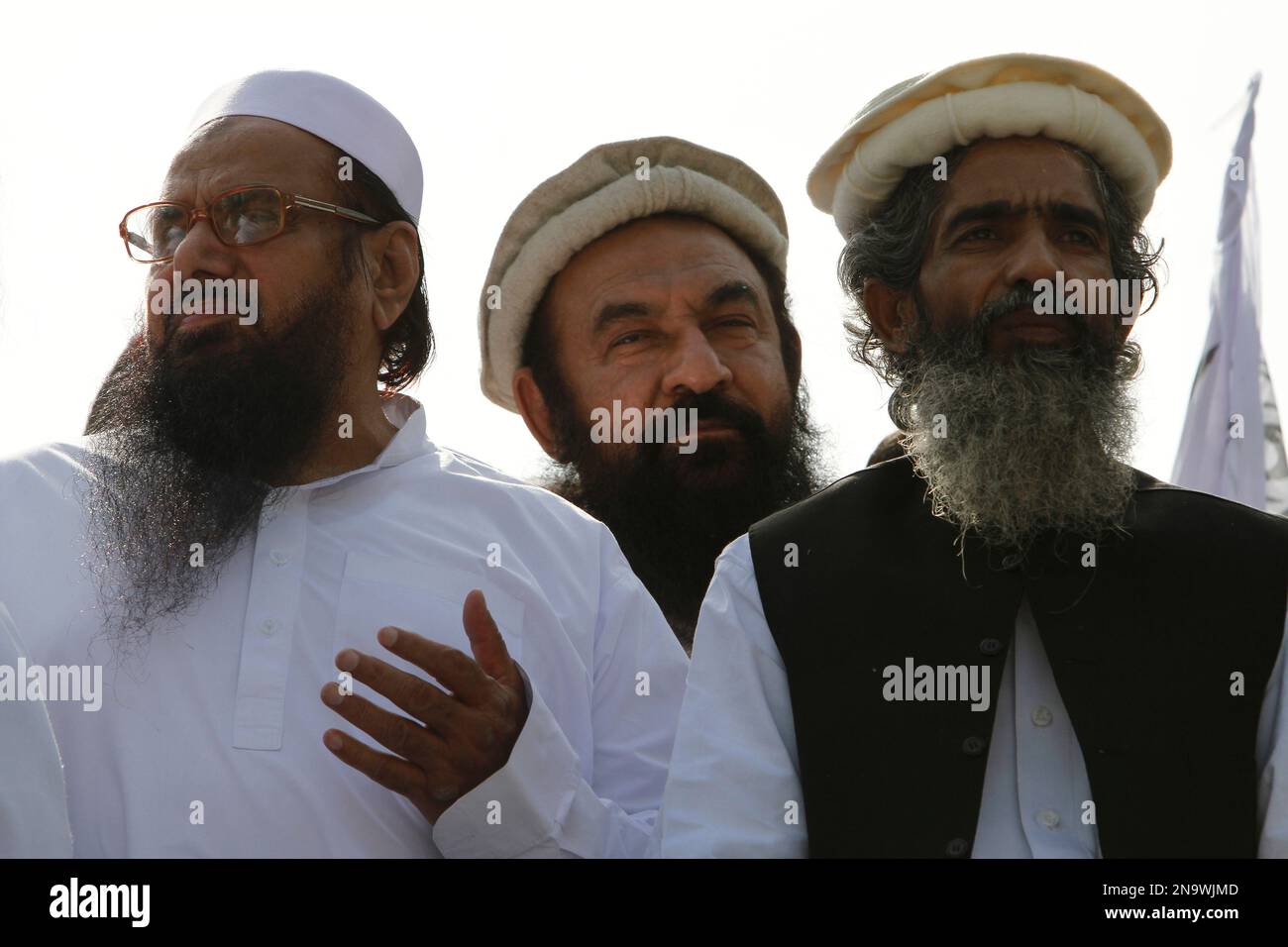 Hafiz Saeed, left, leader of Pakistani religious group Jamaat-ud-Dawa ...