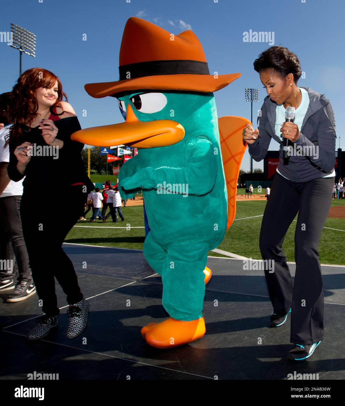 First lady Michelle Obama dances the Platypus dance with Disney actress ...