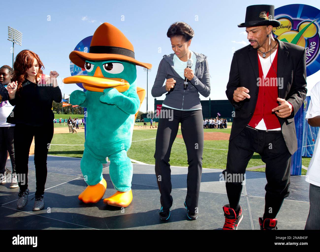 First lady Michelle Obama dances the platypus dance with Disney actress ...