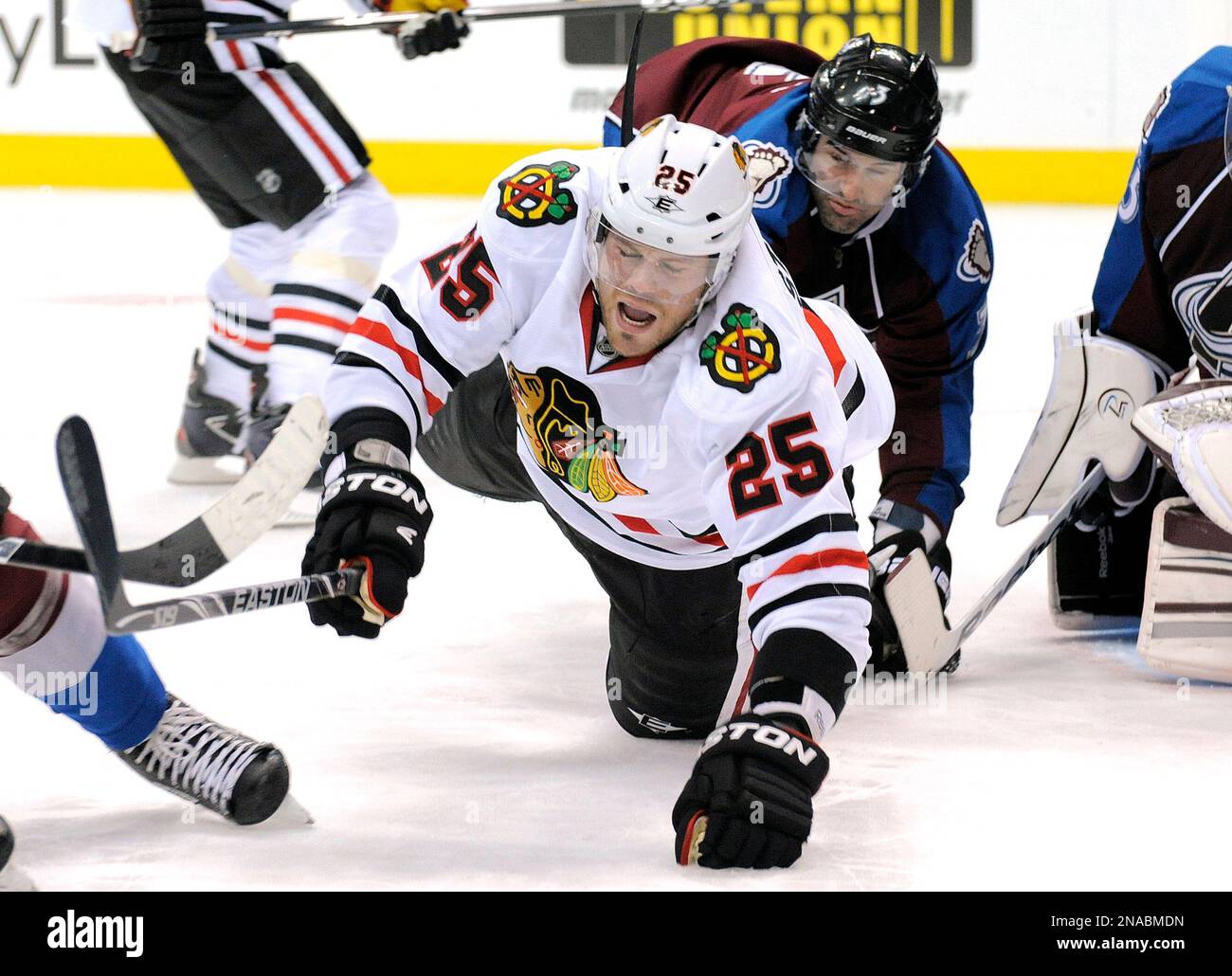 Chicago Blackhawks left wing Viktor Stalberg (25) is tripped by ...