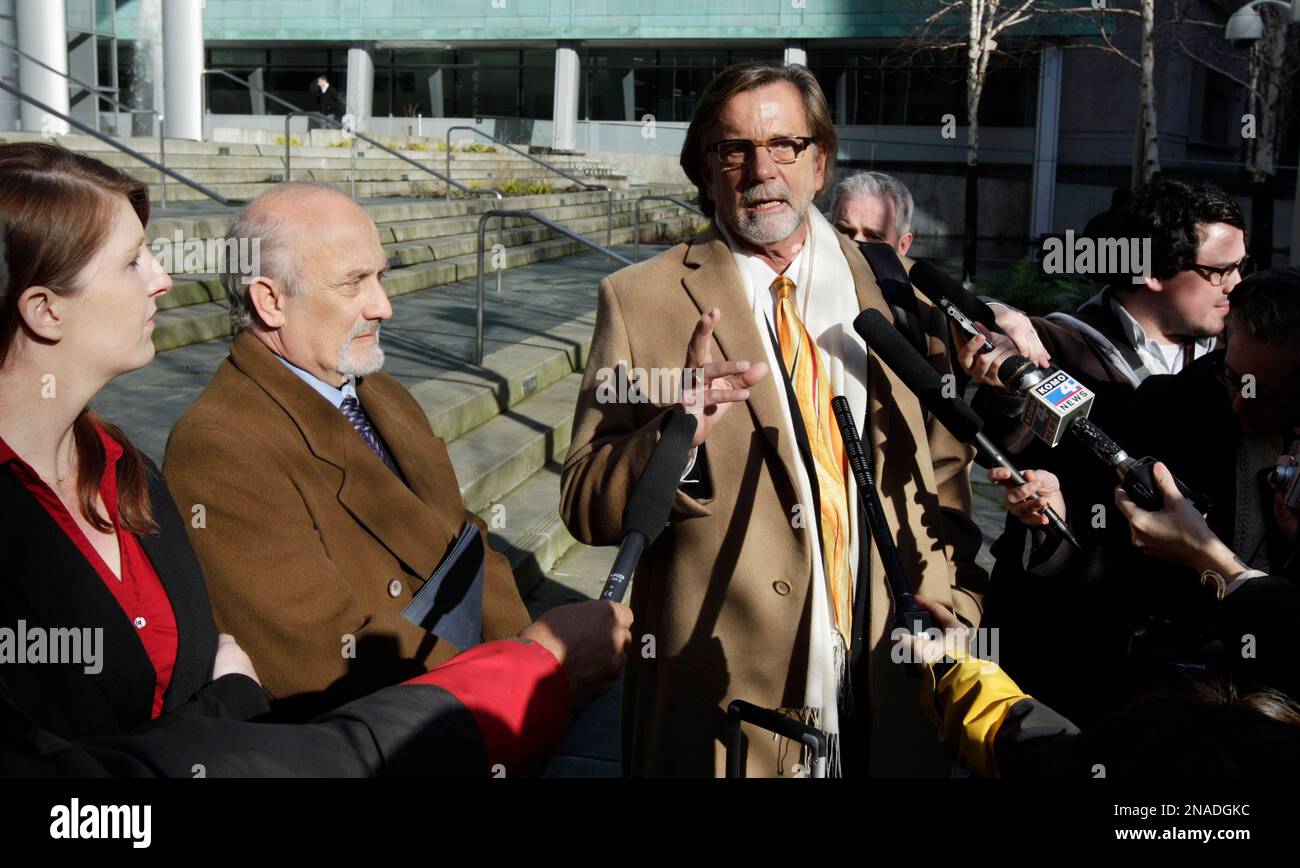 John Henry Browne, center, the attorney for Colton Harris-Moore, who is ...