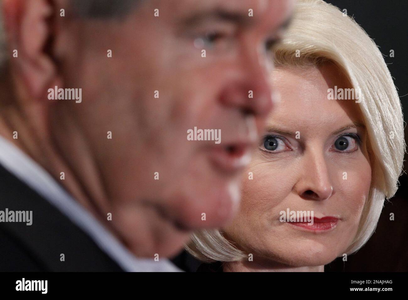 Callista Gingrich listens as her husband Republican presidential ...