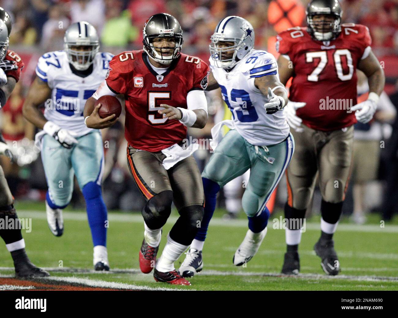 Tampa Bay Buccaneers quarterback Josh Freeman (5) runs away from ...