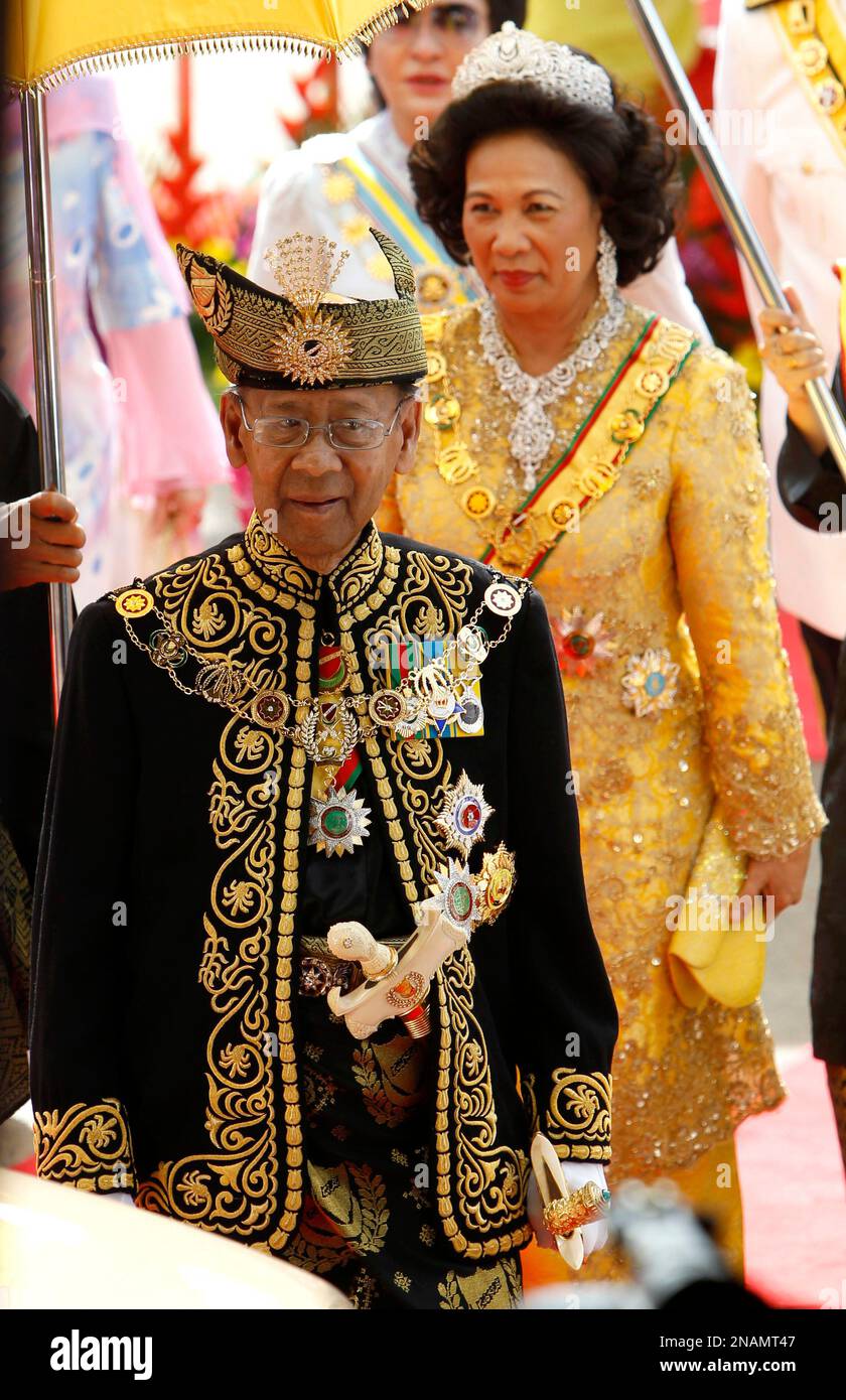 Malaysia's new King Sultan Abdul Halim, front, and Queen Haminah step ...
