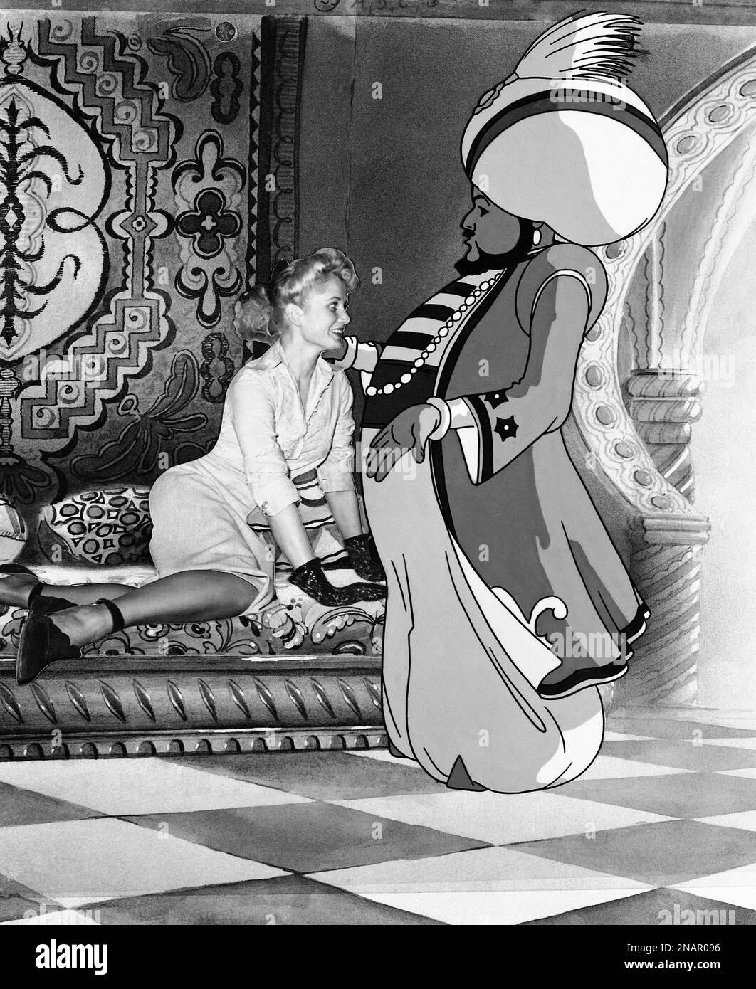 A German film cameraman busy photographing the first animated cartoon ...