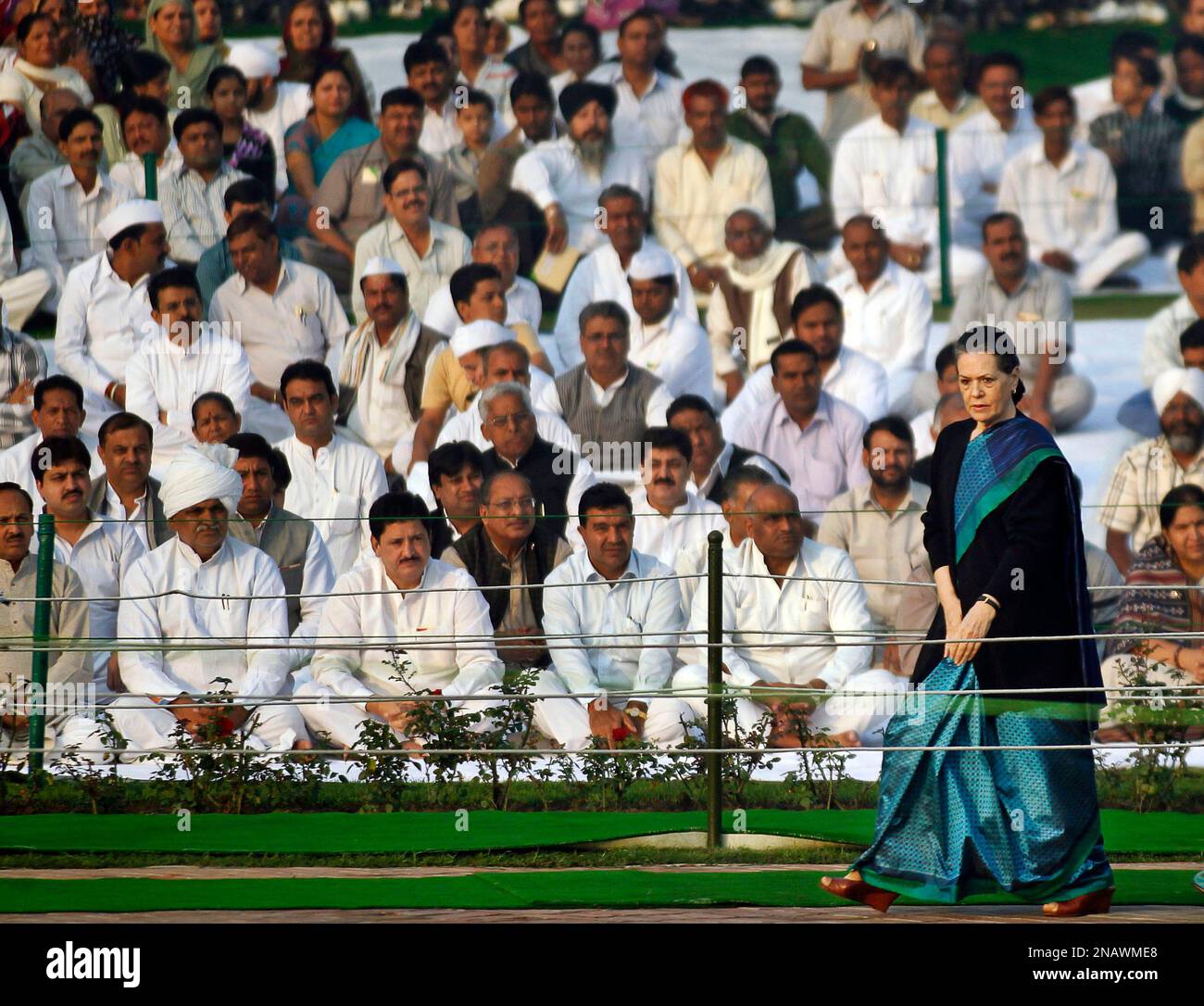 India's ruling Congress party chief Sonia Gandhi arrives to pay tribute ...