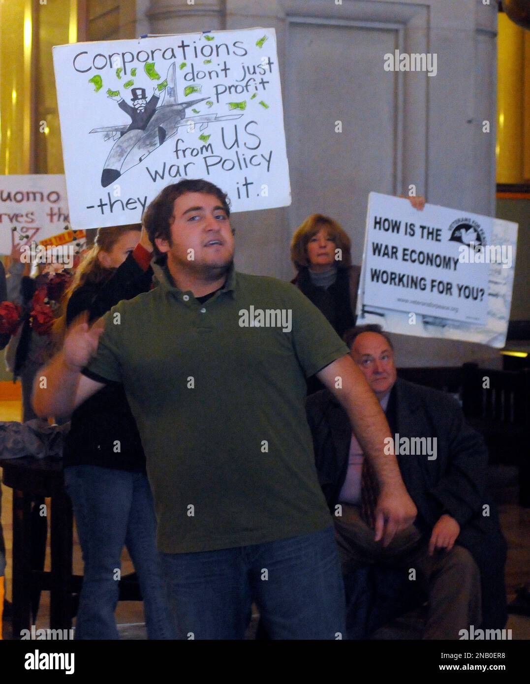 Eyad Alkurabi of Clifton Park, N.Y., speaks to demonstrators supporting ...