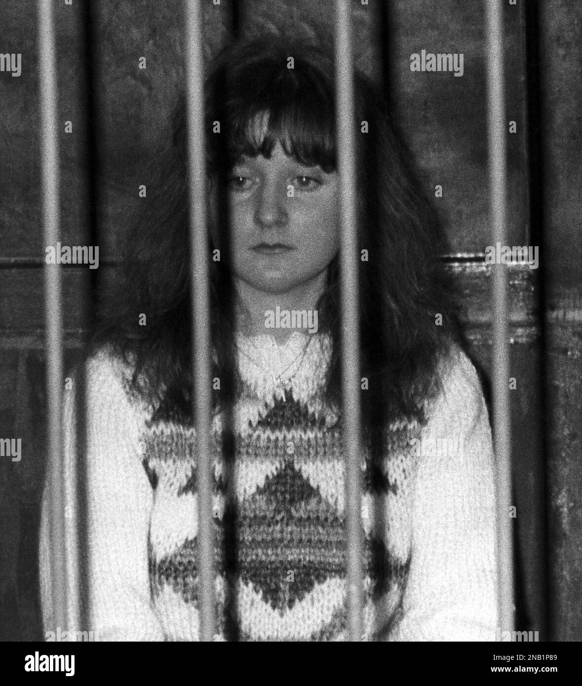 Carol Compton, a 21 - year - old Scottish nanny, is seen behind the bars on Monday, December 12 ...