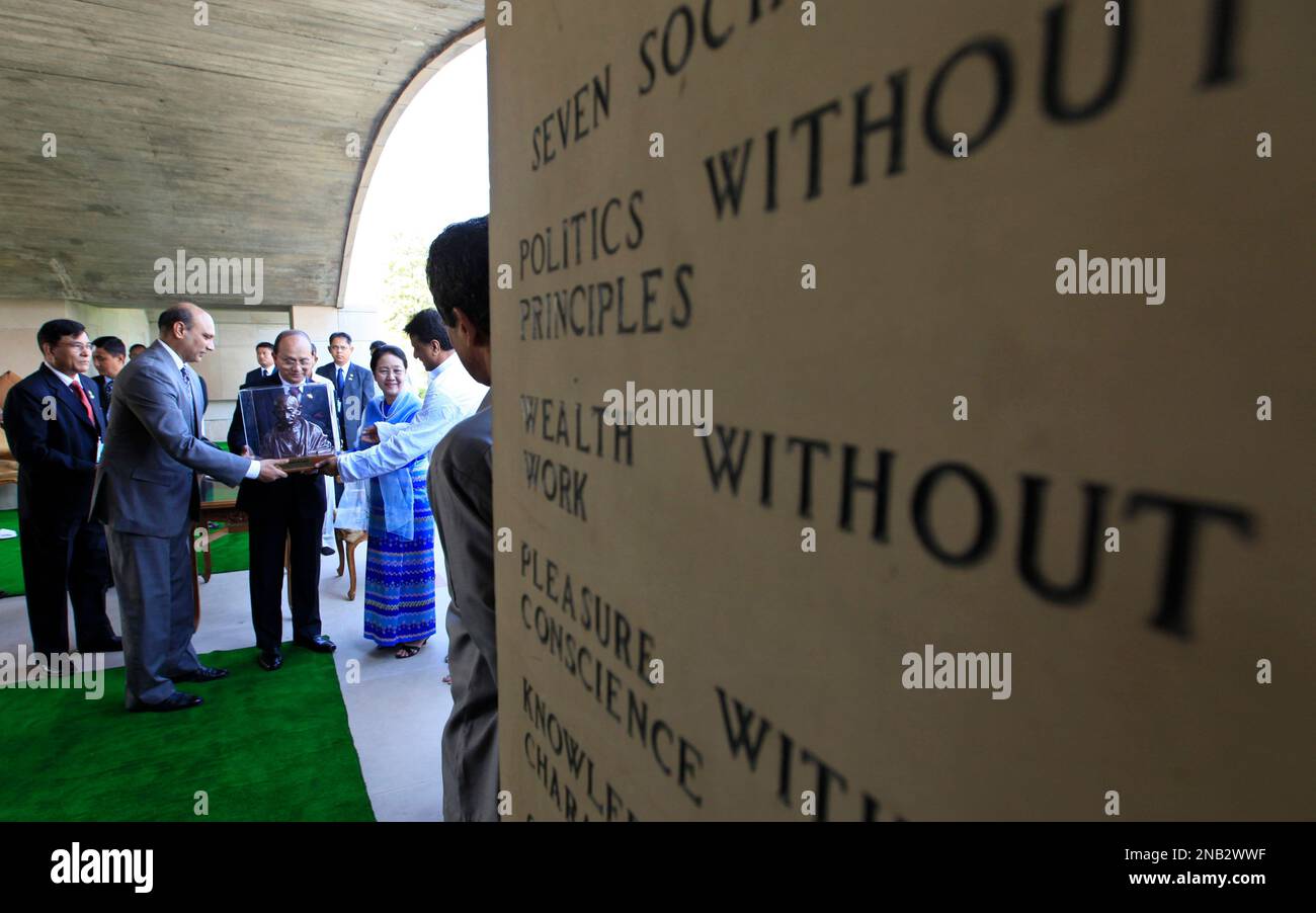 Myanmar President Thein Sein, third from left, and his wife Daw Khin Khin Win, fourth from left ...