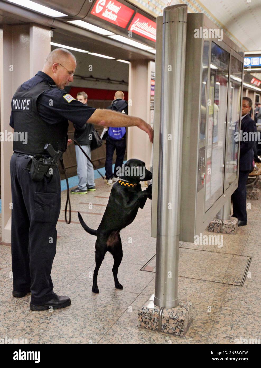 In this photo taken Wednesday, Sept. 7, 2011, Chicago Police officer ...