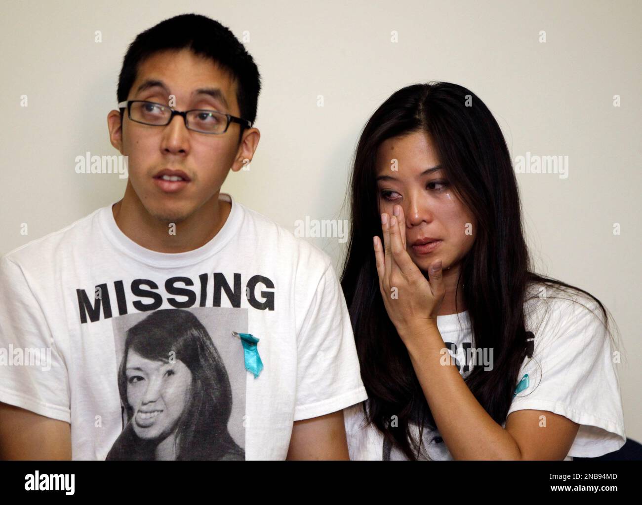 Michael Le, left, brother of Michelle Le, and Krystine Dinh, right ...