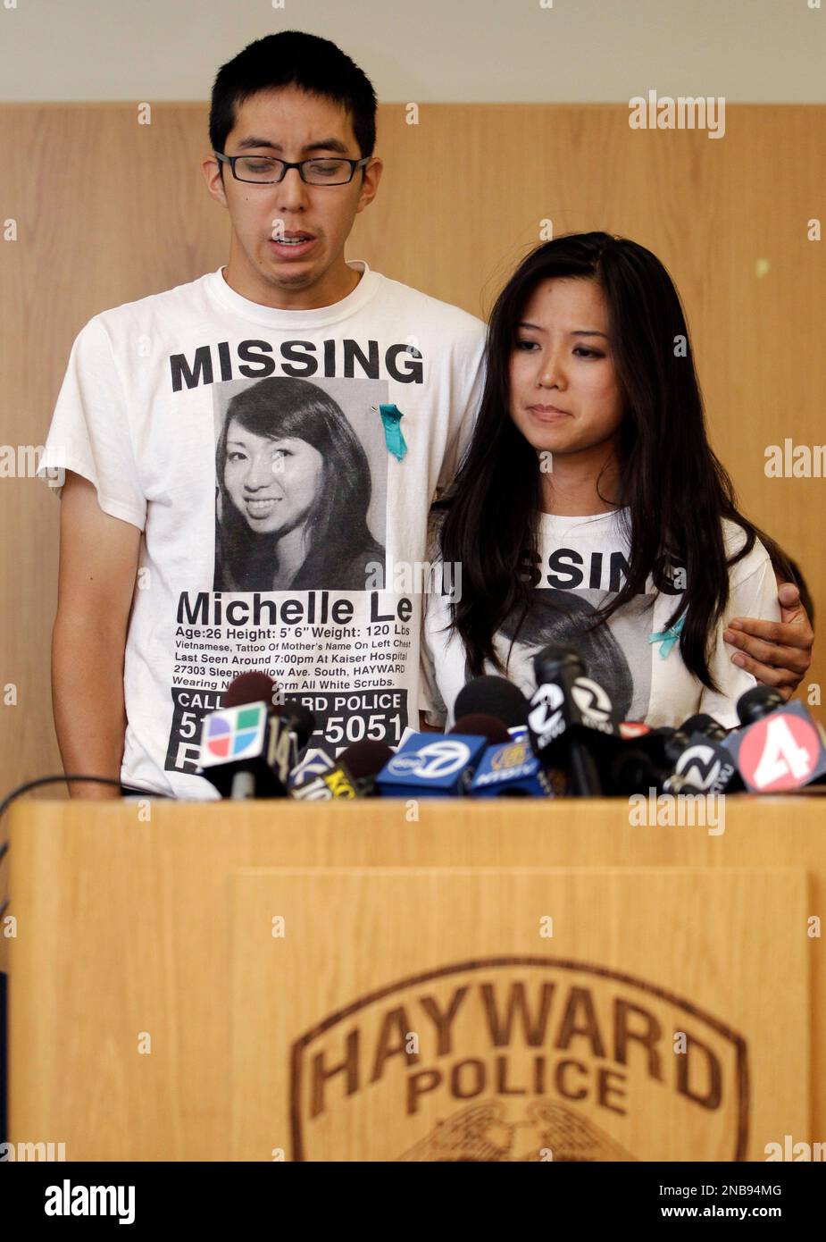 Michael Le, left, brother of Michelle Le, and Krystine Dinh, right ...