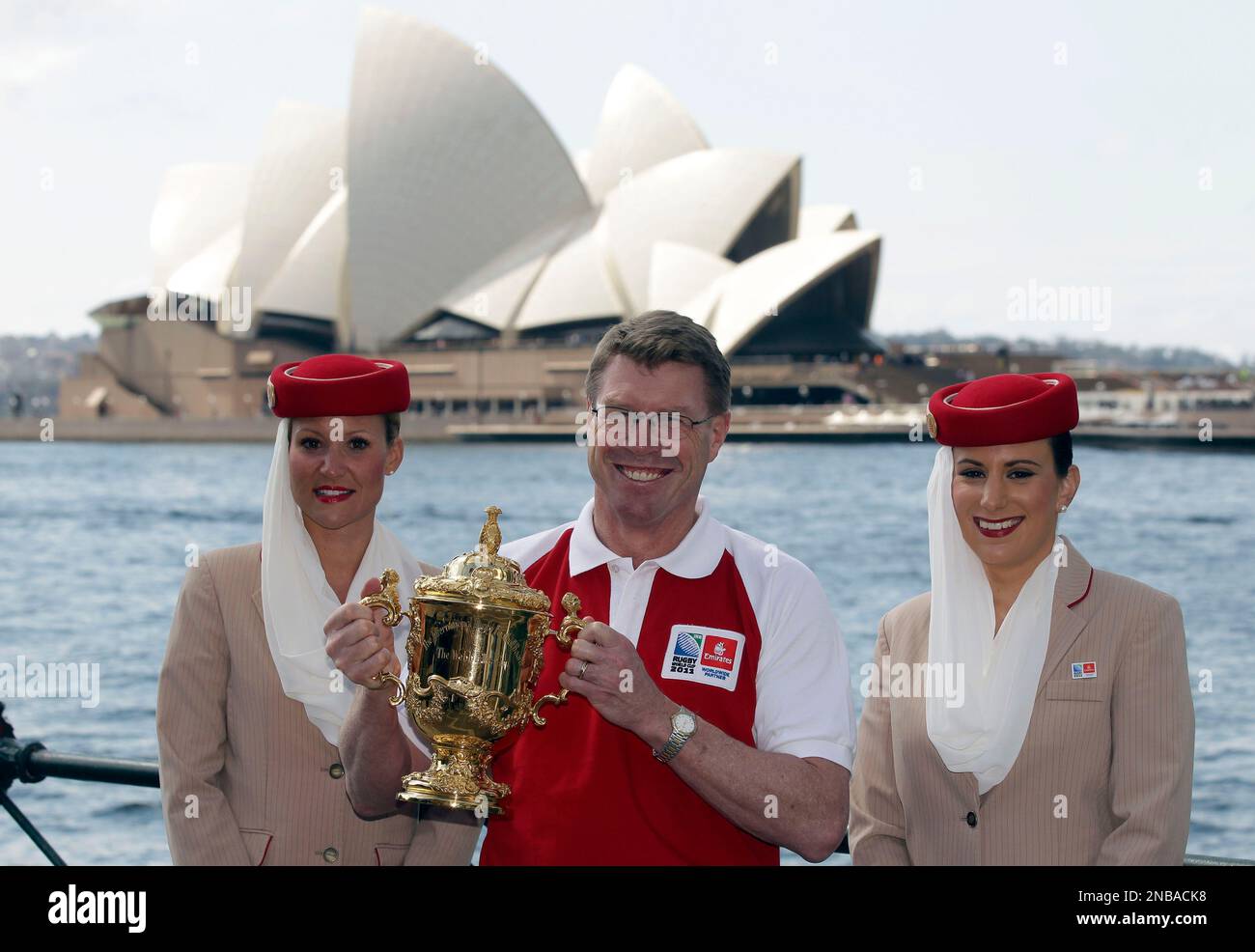 Former Wallabies captain Nick Far-Jones, center, holding the Webb Ellis ...