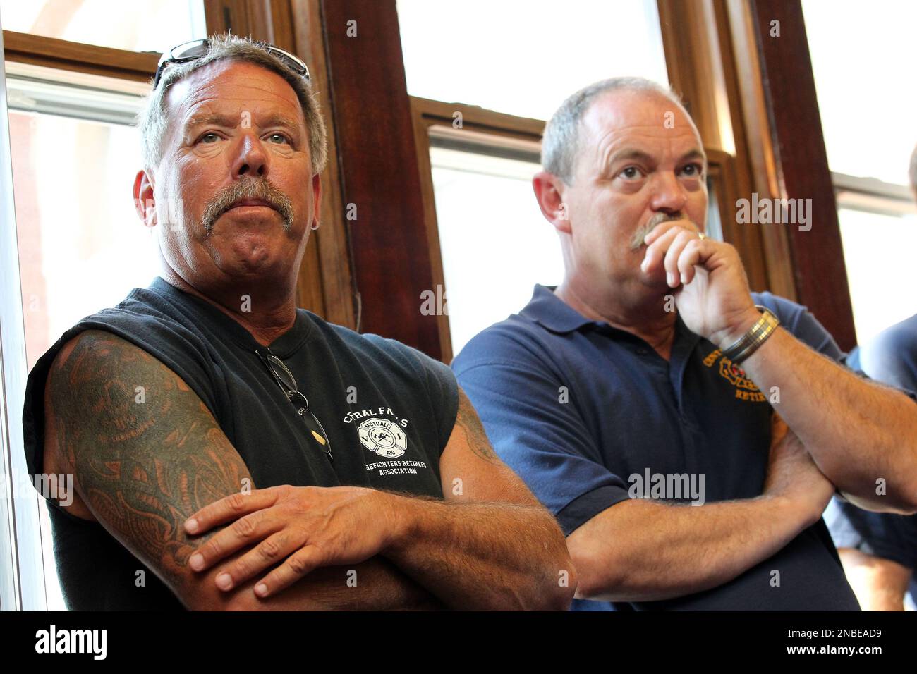 Retired Central Fall, R.I., firefighters Rick McDermott, left, and Paul ...