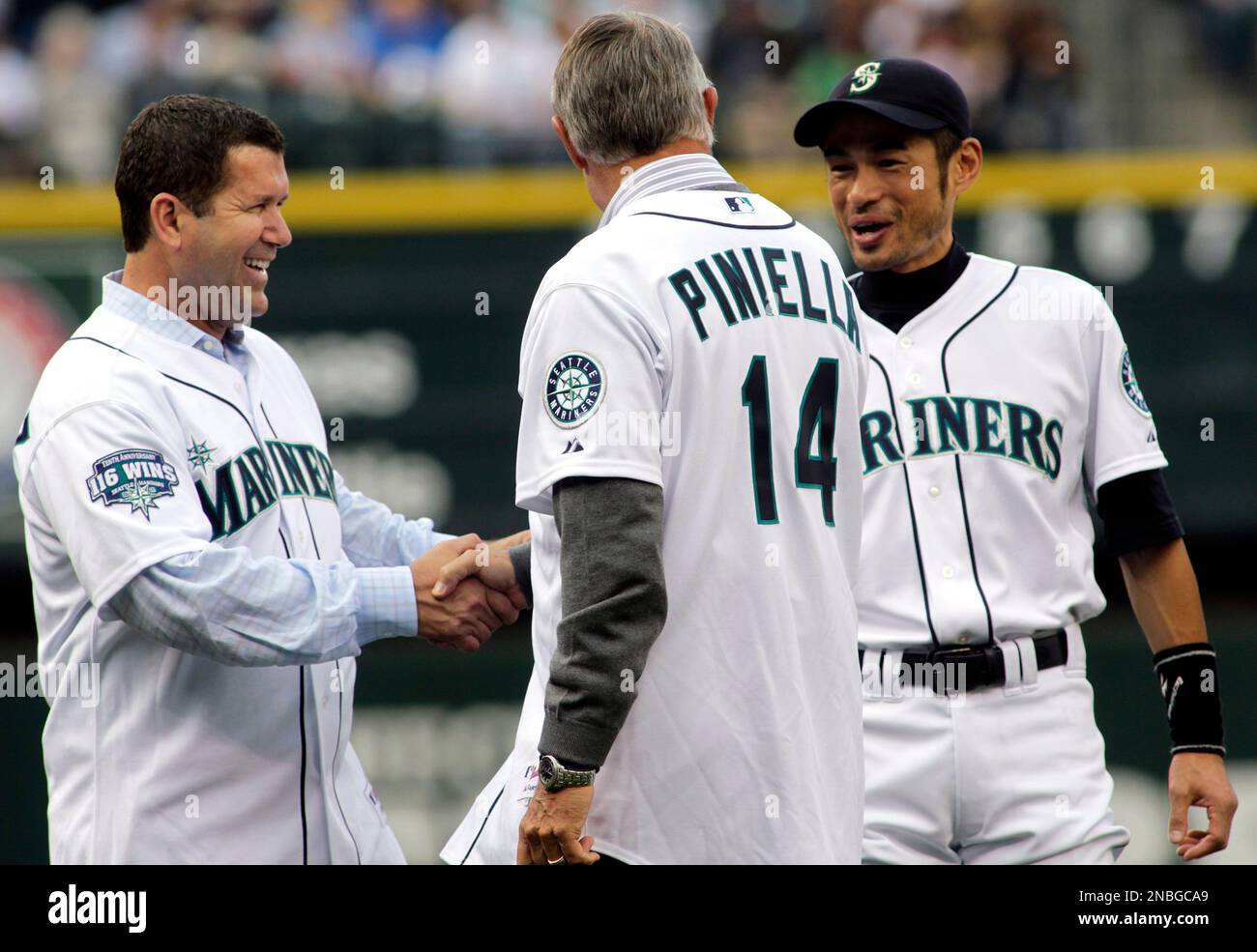 Former Seattle Mariners manager Lou Piniella (14) greets Mariners ...