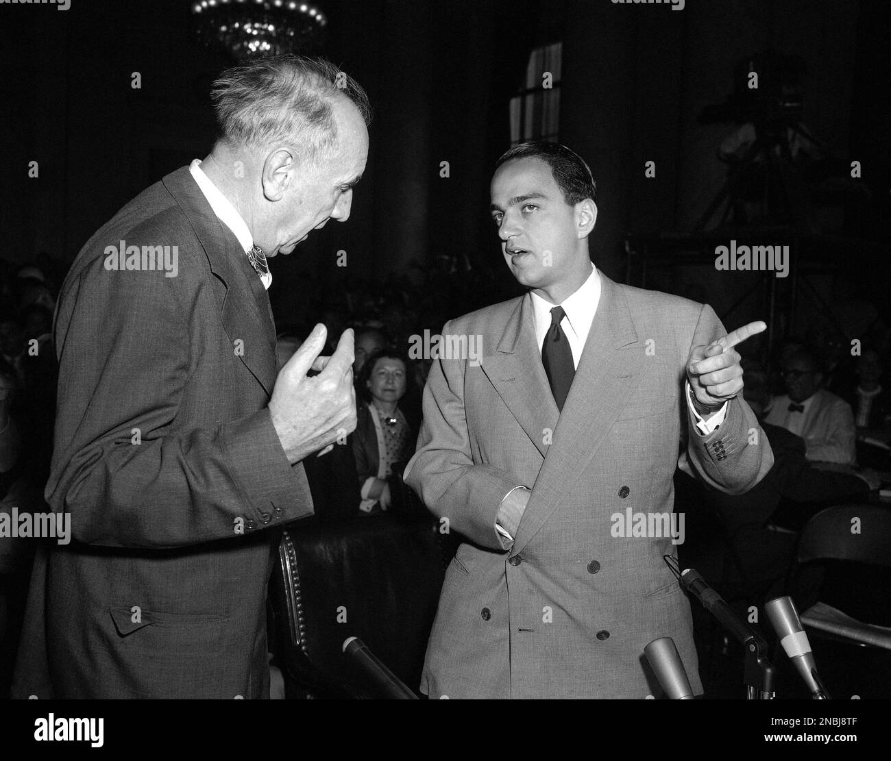 Army Counsel Joseph Welch, left, and Roy M. Cohn talk at the same time ...