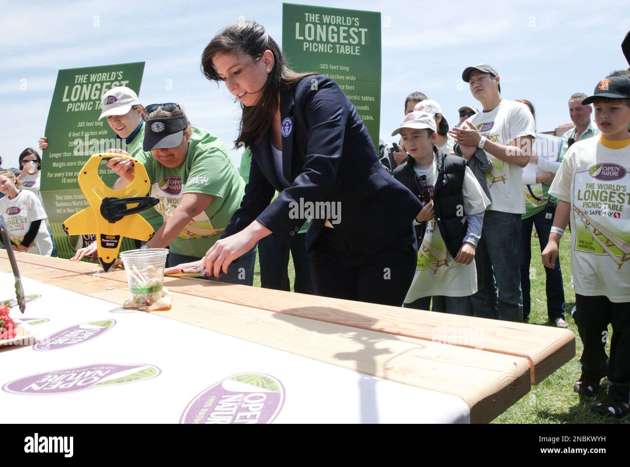 Kim Partrick, adjudicator from the Guinness World Records, measures the ...