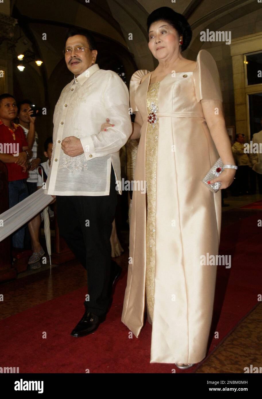 Former Philippine president Joseph Estrada, left, and congresswoman ...
