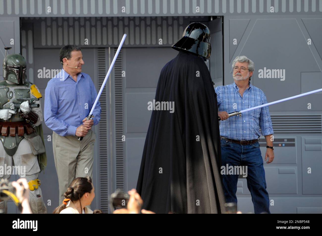 Disney CEO Robert Iger, second from left, and Star Wars creator George ...