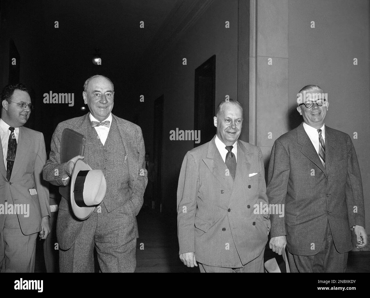 Secretary of the Army Robert Stevens, left, is ushered into a closed ...