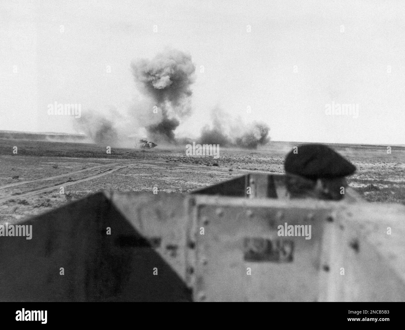 Smoke rises form the explosion of a “Bangalore” a delayed-action bomb ...