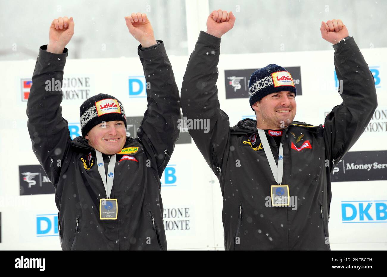Austria's Wolfgang Linger, left, and Andreas Linger celebrate with ...
