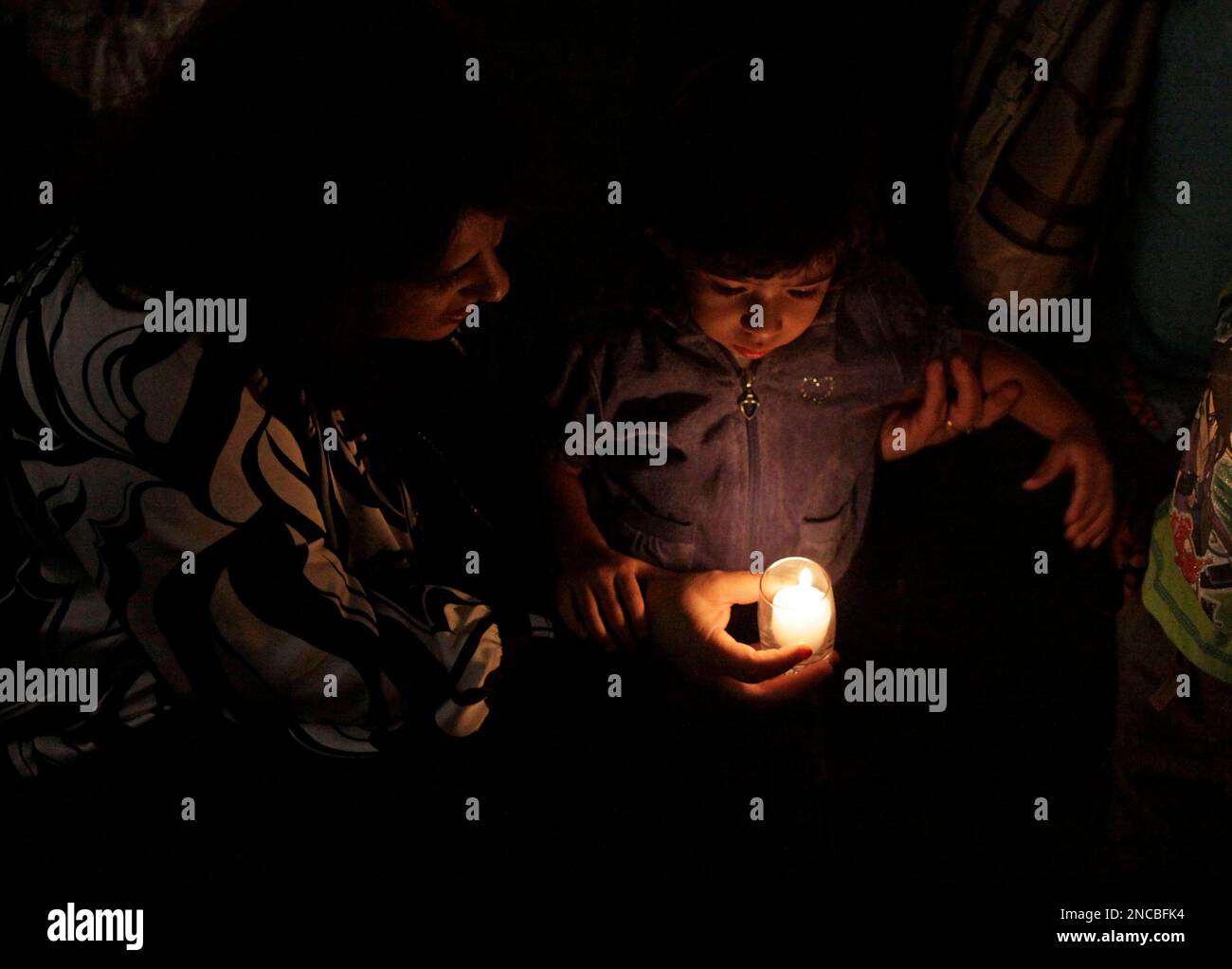People light candles in Johannesburg in prayer for the recovery of ...