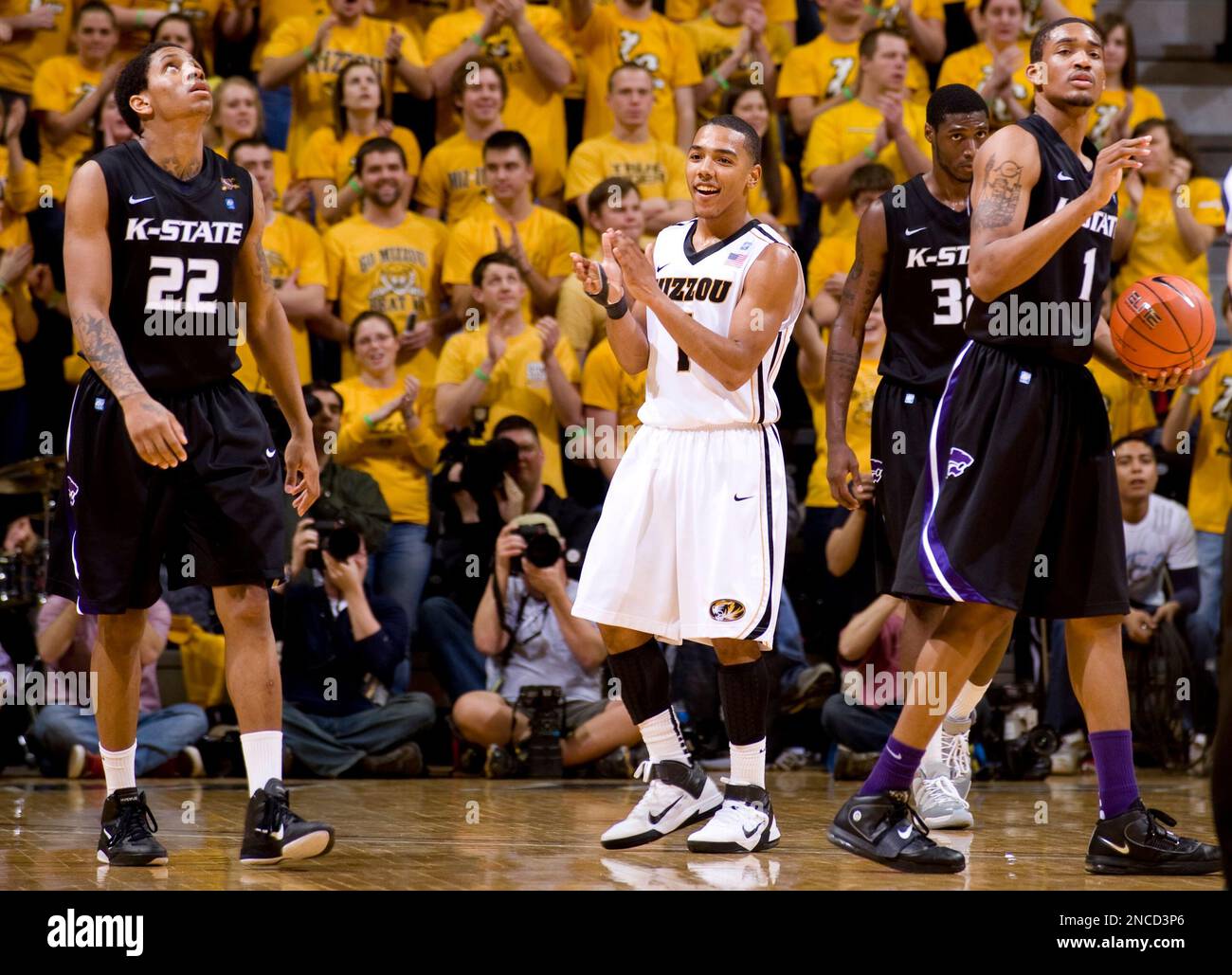 Missouri's Phil Pressey, center, celebrates after a Kansas State foul ...