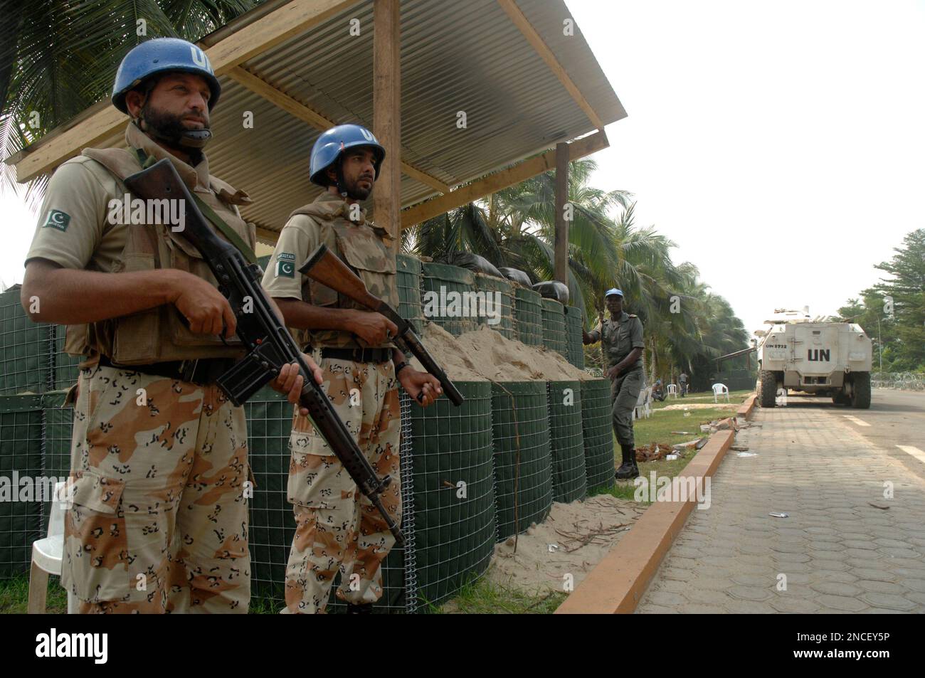 Pakistani United Nations soldiers stand guard outside the entrance to ...