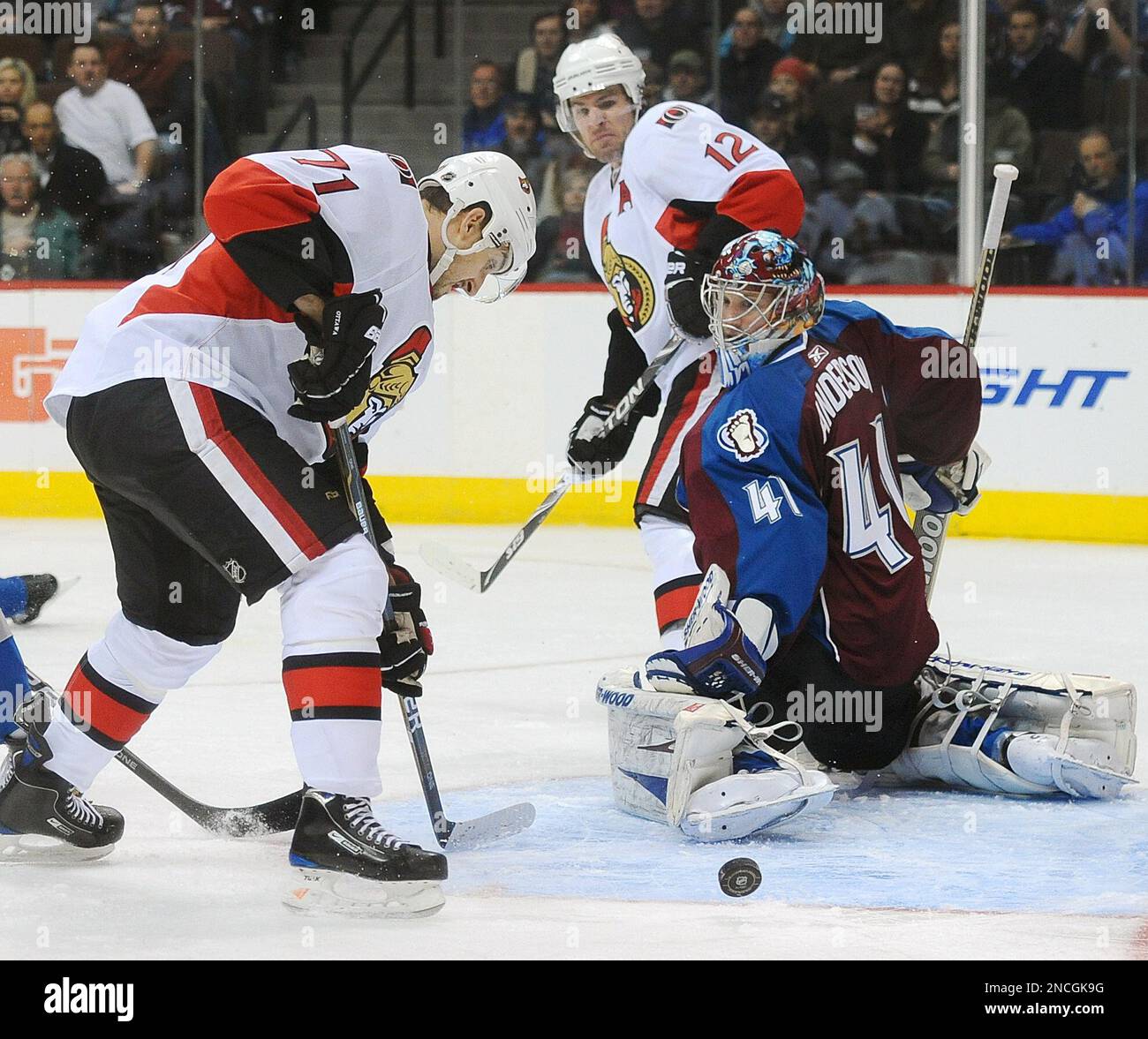 Ottawa Senators left wing Nick Foligno tries to put the puck past ...