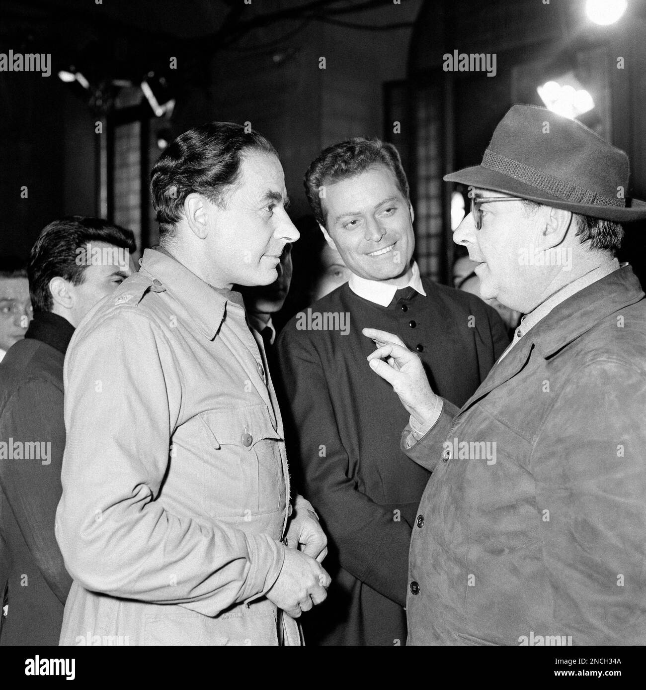 Italian movie director Roberto Rossellini, right, gives instructions to ...