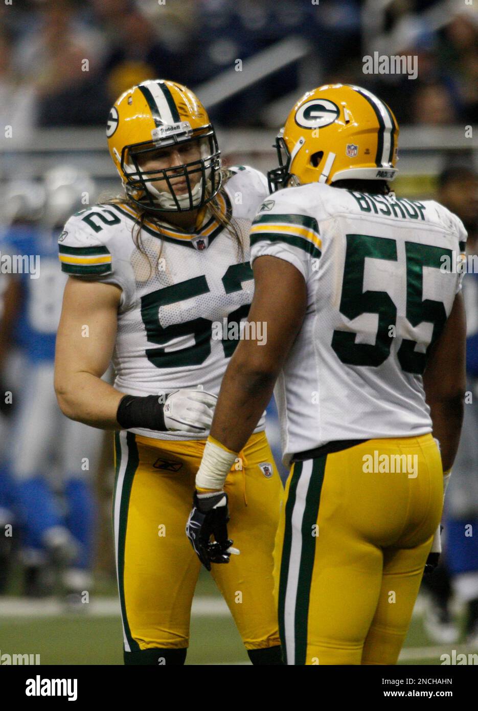 Green Bay Packers' Clay Matthews (52) chats with Desmond Bishop (55) in ...