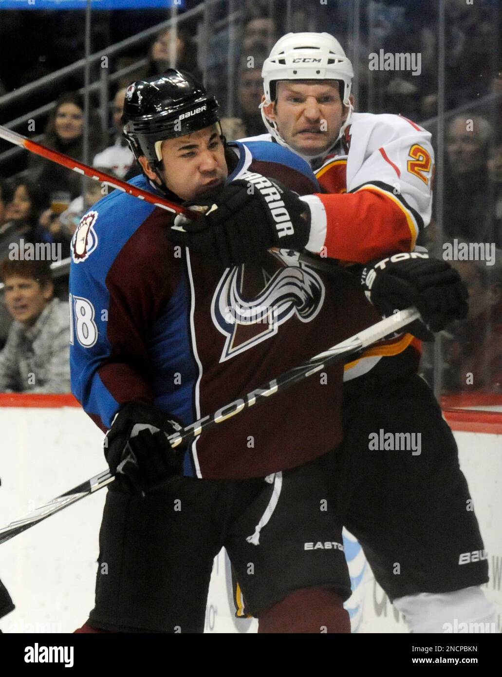 Colorado Avalanche right wing Brandon Yip (18),left, is hit in the face ...