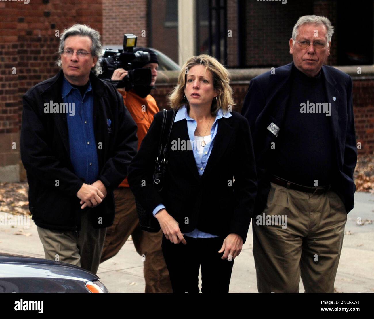 Dr. William A. Petit Jr., left, arrives with his sister Johanna Chapman ...