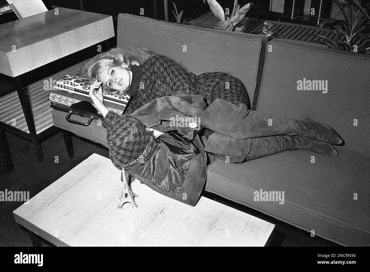 American actress Carroll Baker lying down in Paris, France before ...