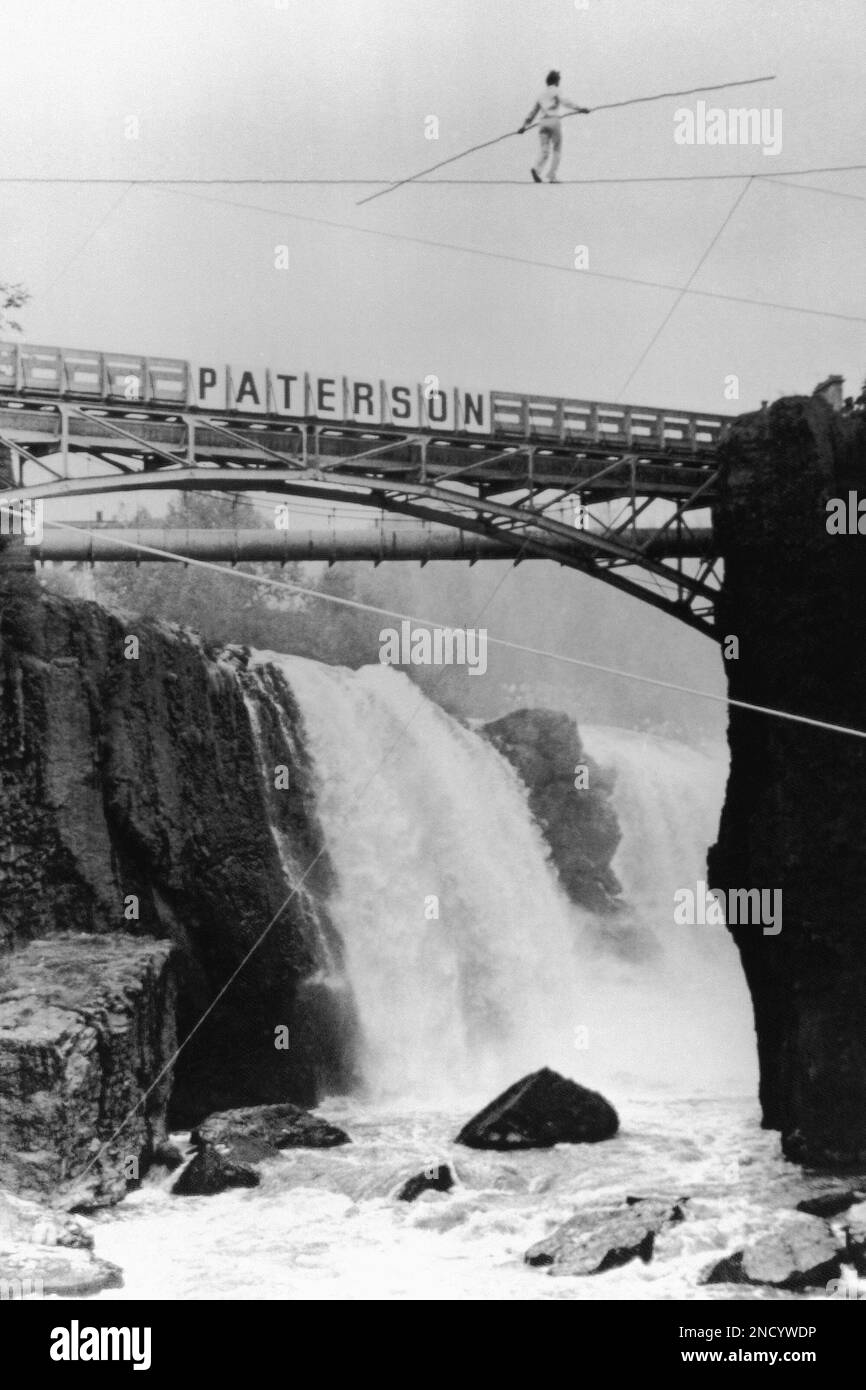 French tightrope walker Philippe Petit walks along a cable at Paterson ...
