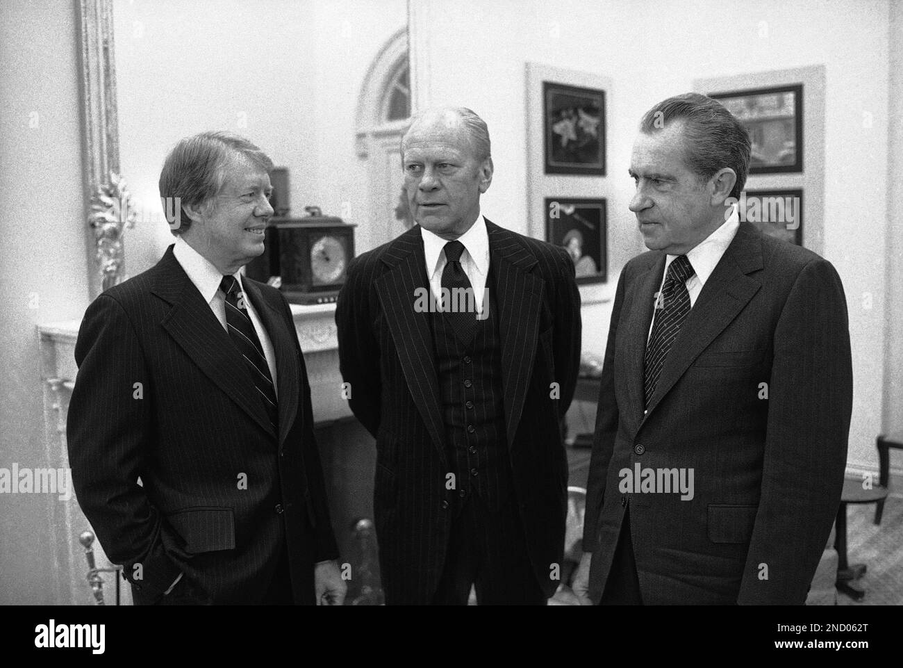 President Jimmy Carter stands with former Presidents Richard M. Nixon ...