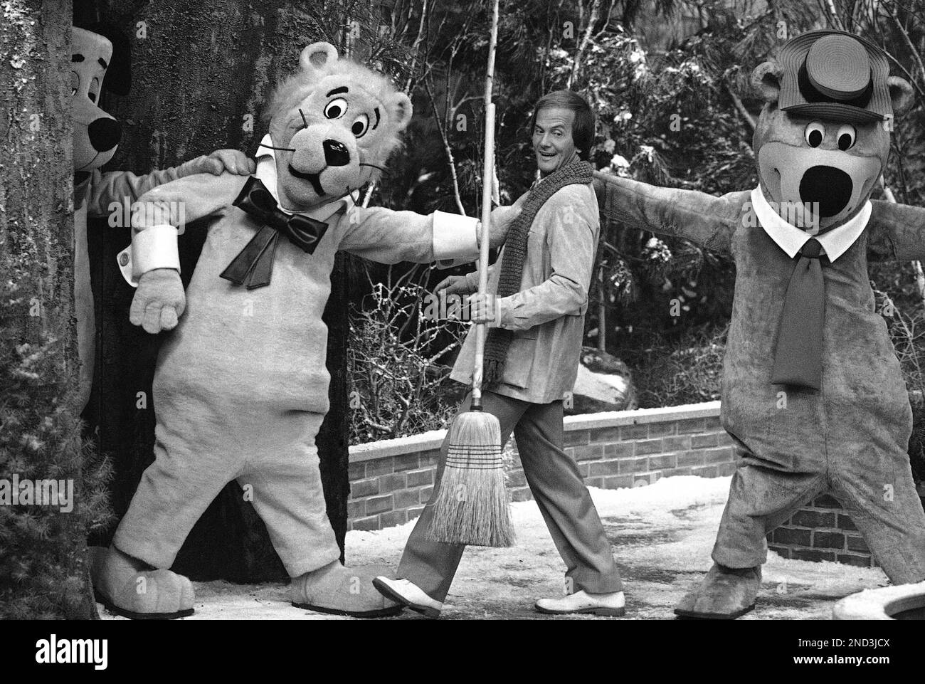 Singer Pat Boone does a dance with Hanna-Barbera characters Yogi Bear ...