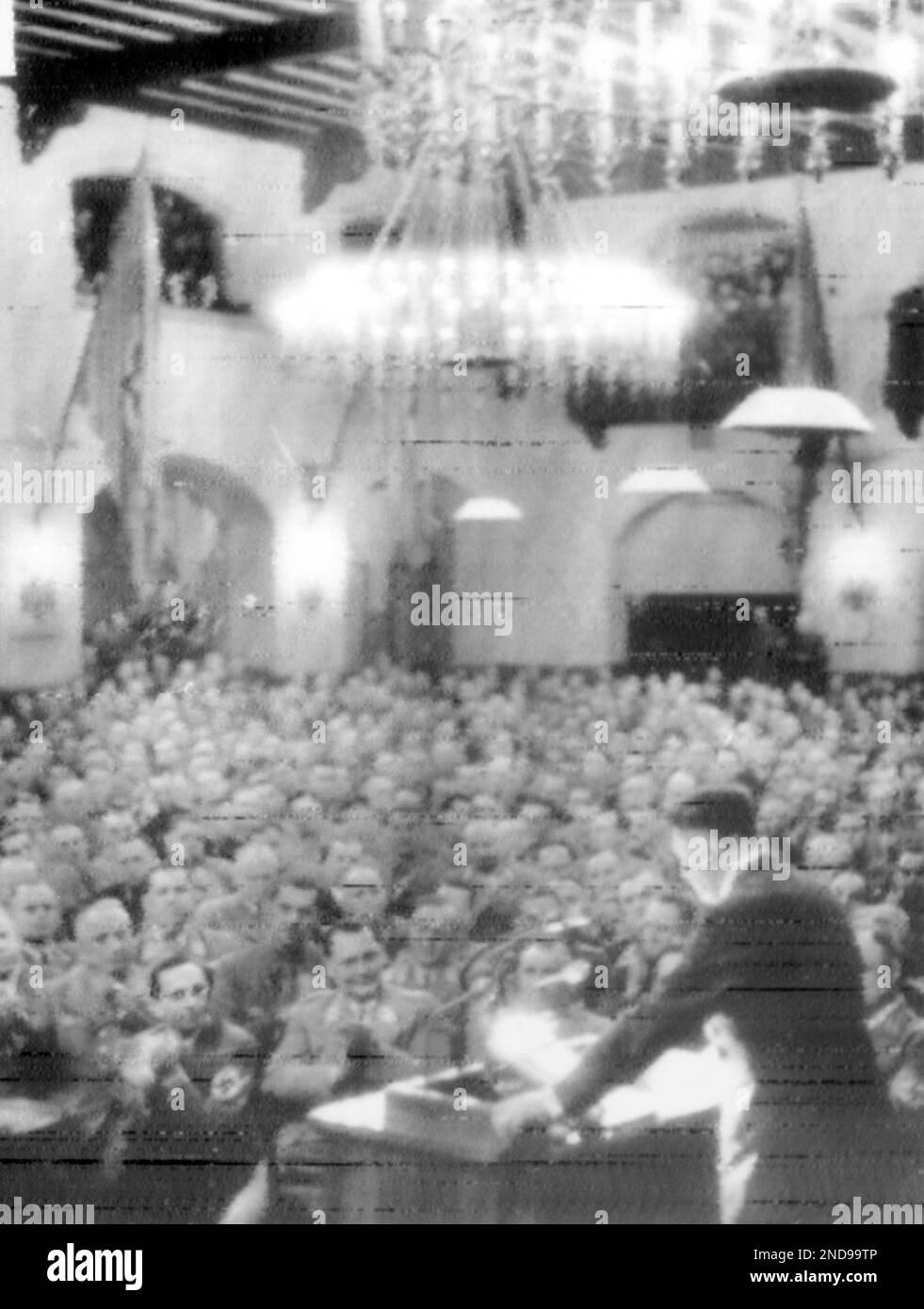 Adolf Hitler (right foreground) addresses Nazi party leaders in a ...