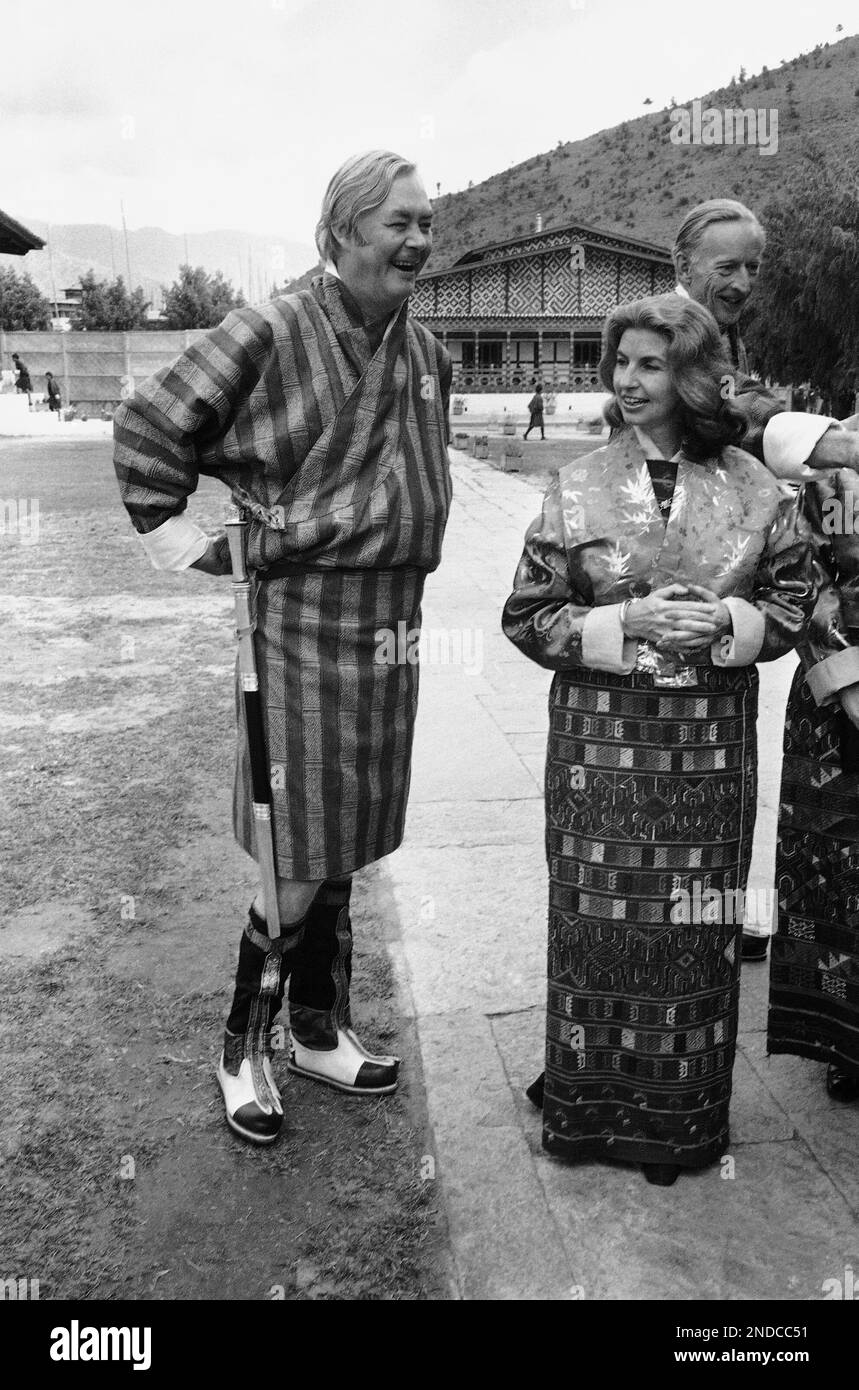 U.S. Ambassador Daniel P. Moynihan, center, wearing Bhutanese “Kho ...