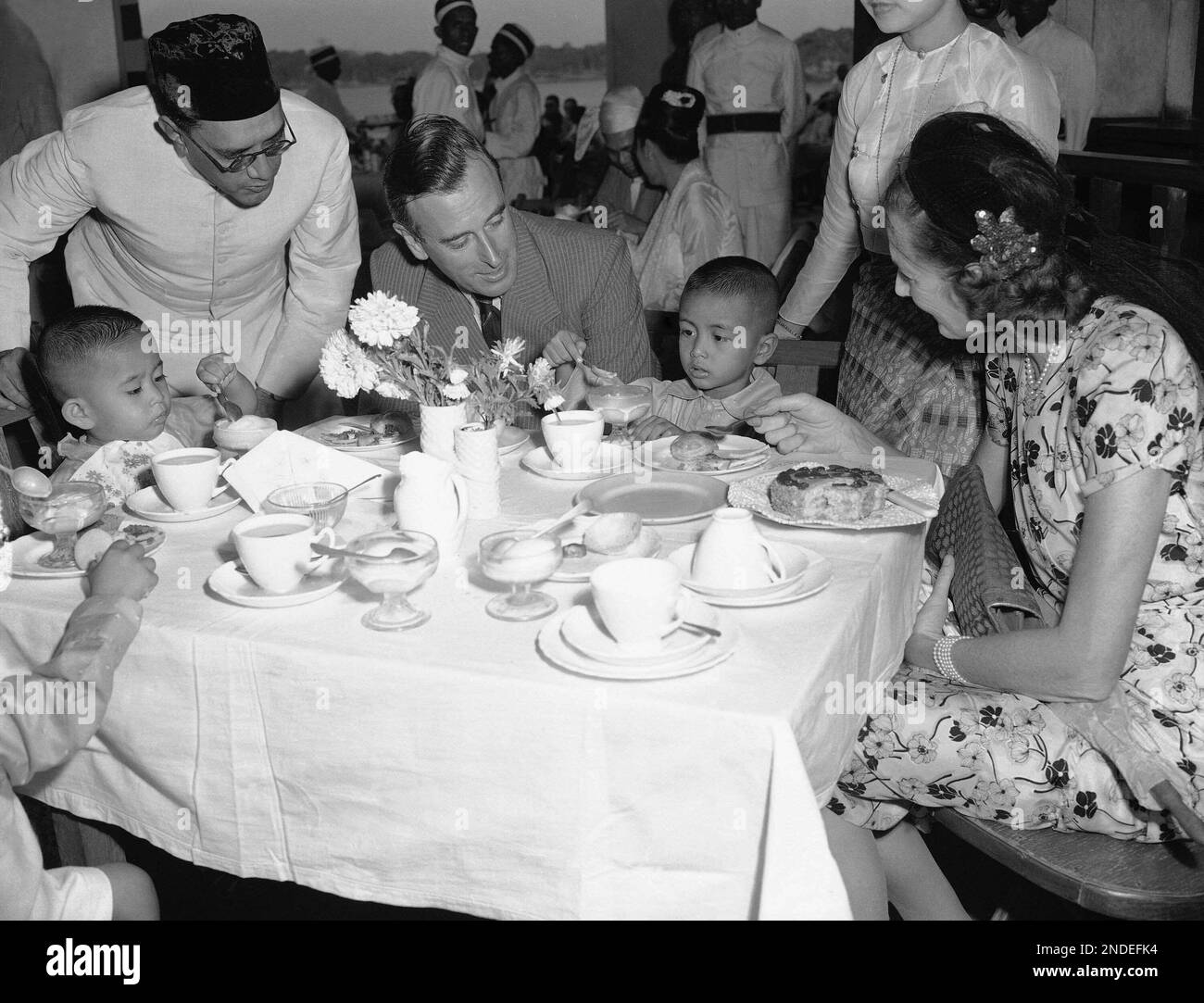 Lord Louis Mountbatten and his wife Edwina are attentive watchers as ...