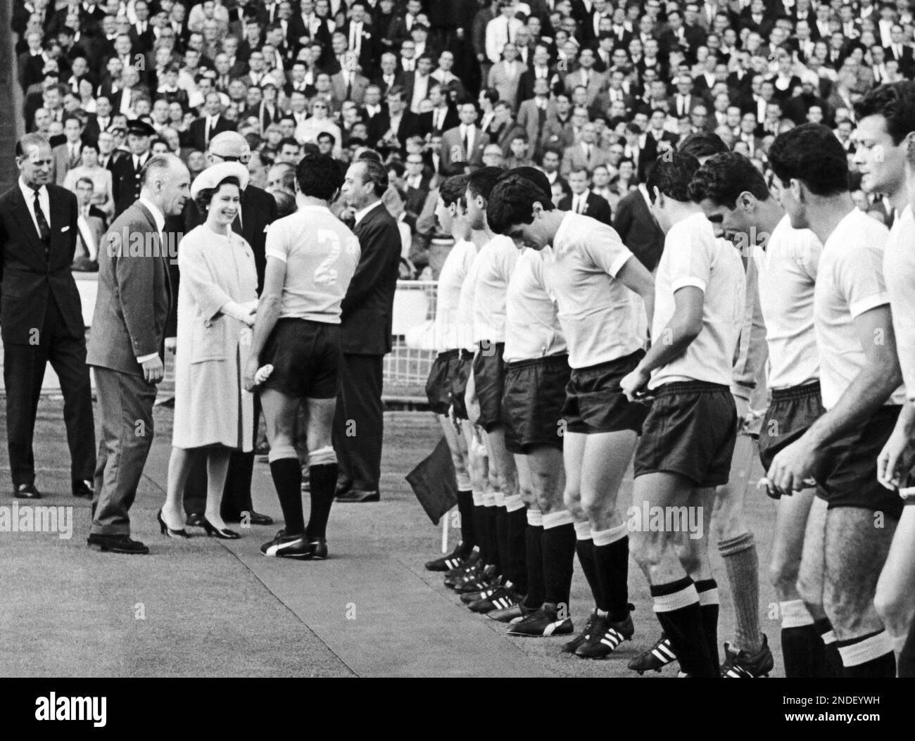 Queen Elizabeth II shakes hands with football player Horacio Troche of ...