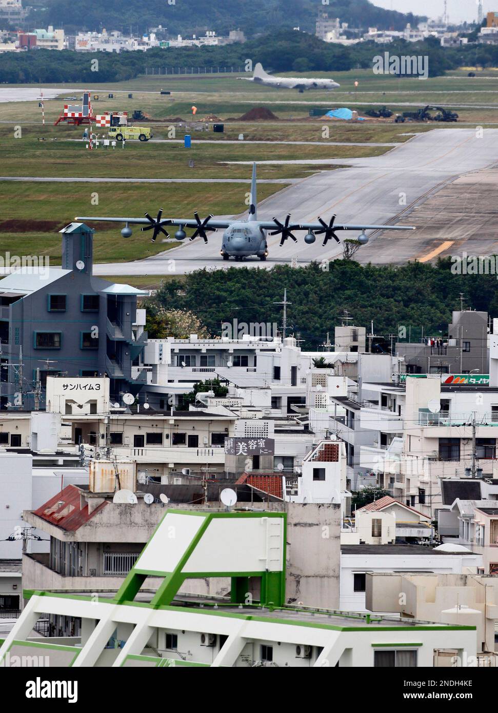 FILE - In this Dec. 17, 2009 file photo, a military transport plane ...