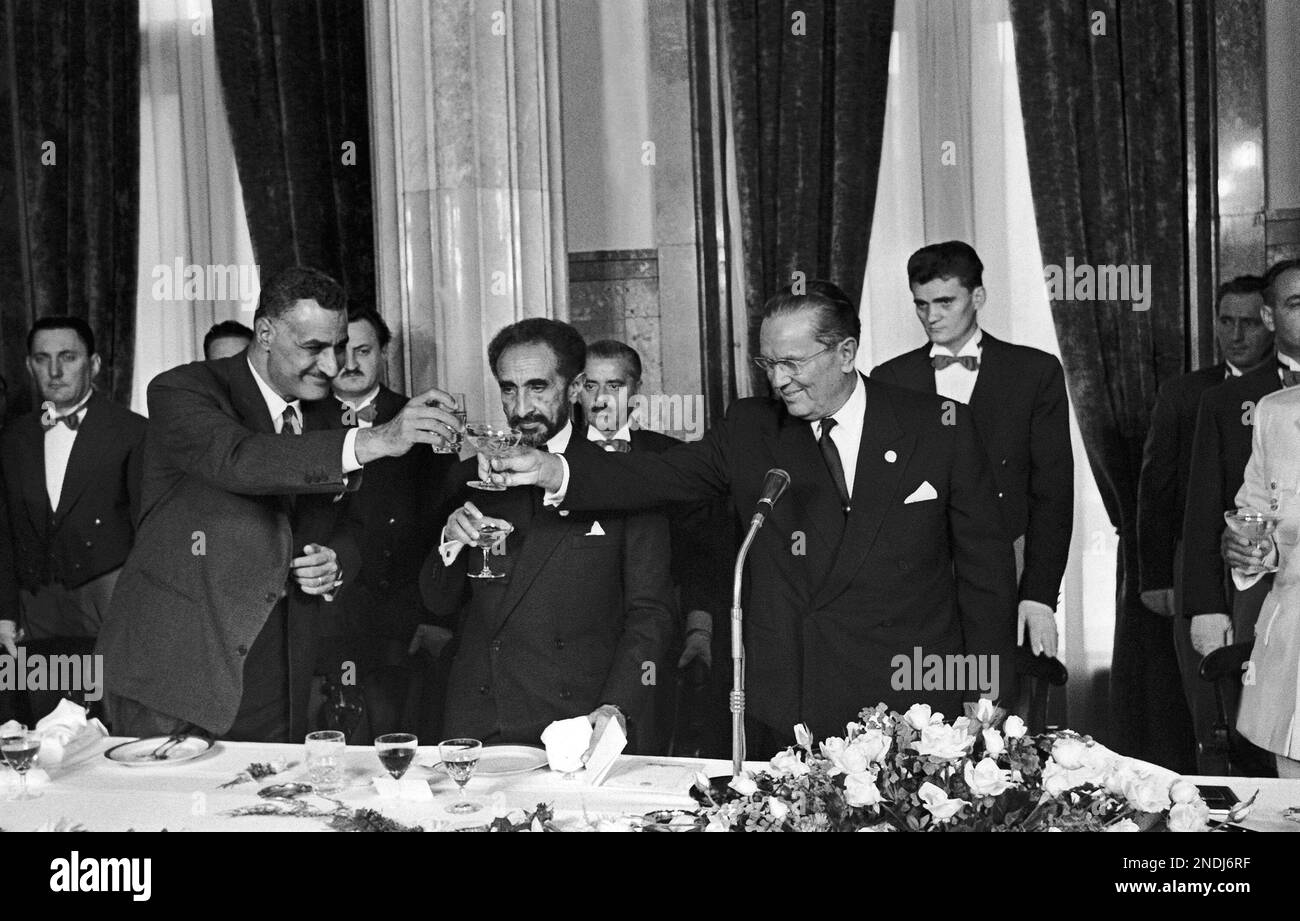 President Josip Broz Tito of Yugoslavia, right, clinks glasses in a ...