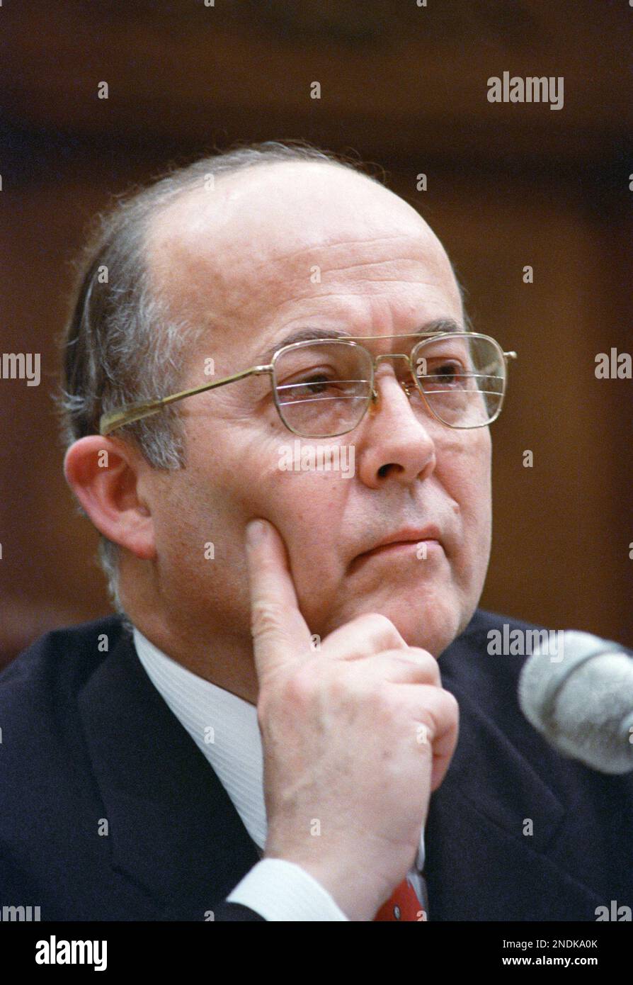 Former National Security Advisor John Poindexter ponders a question ...