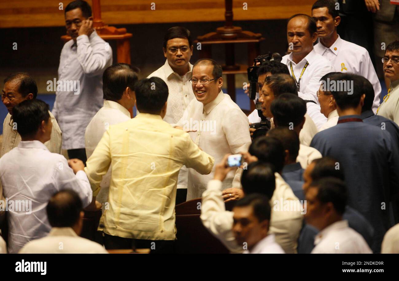Philippine President-elect Benigno Aquino III, center, is congratulated ...