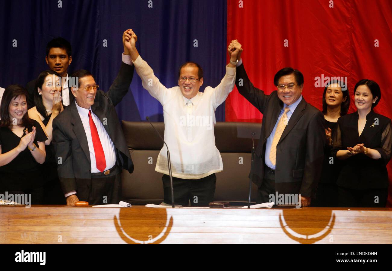 Philippine President-elect Benigno Aquino III, center, is jointly ...