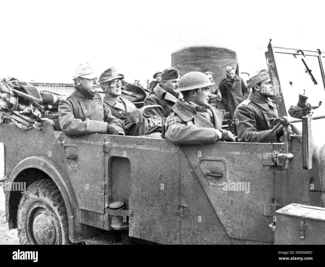 Major General Schmidt (rear seat, wearing goggles), in command of the ...